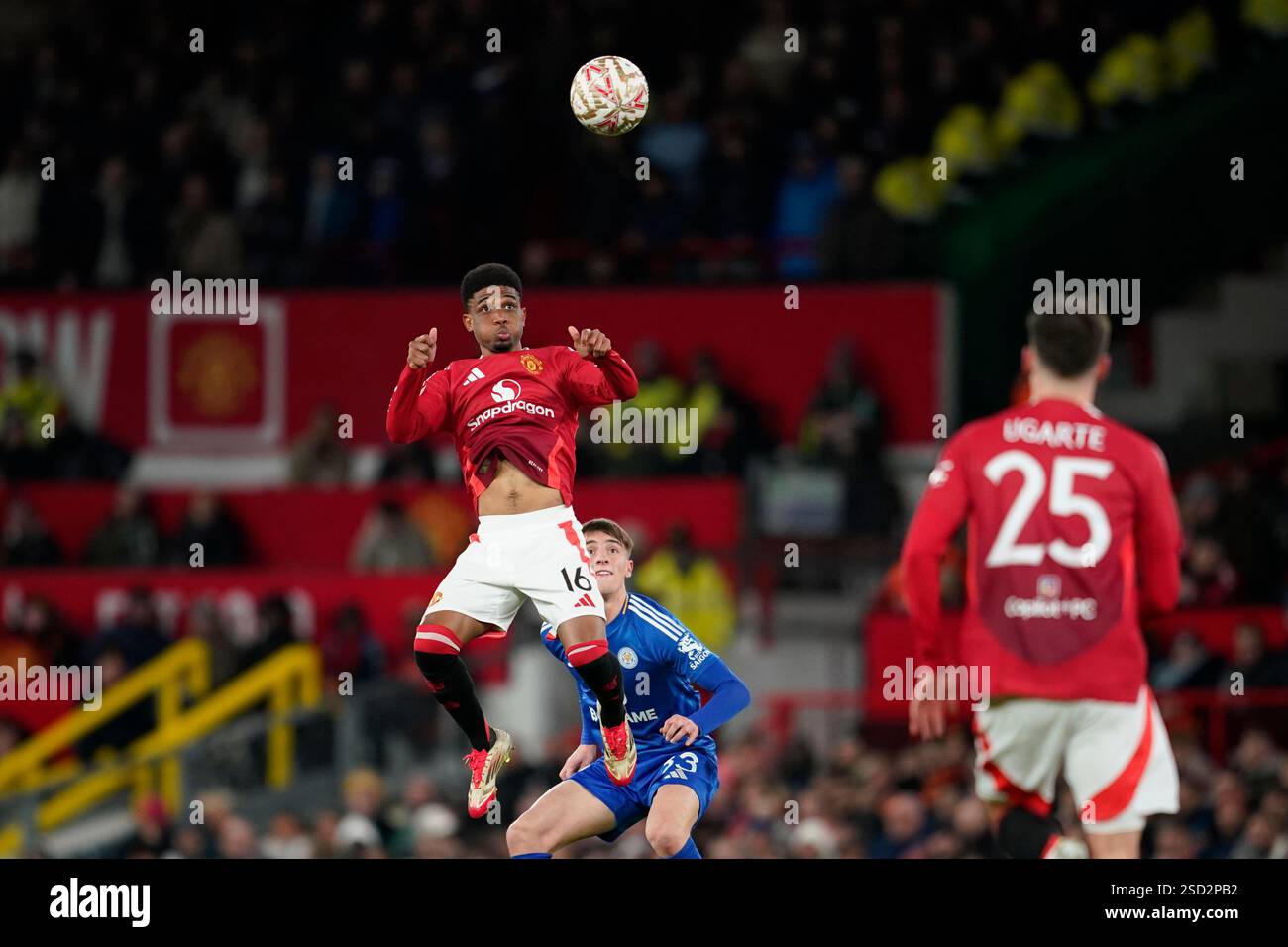 Manchester United's Amad Diallo, top, and Leicester's Luke Thomas ...