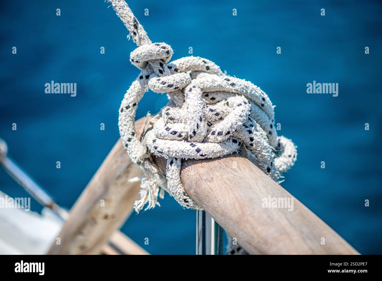A detailed view of the essential components of a sail, including ropes ...