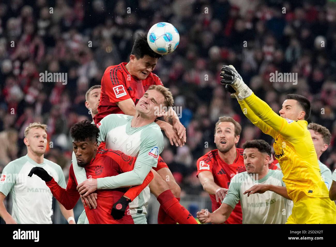 Bremen's goalkeeper Michael Zetterer, right, goes up for a save against ...