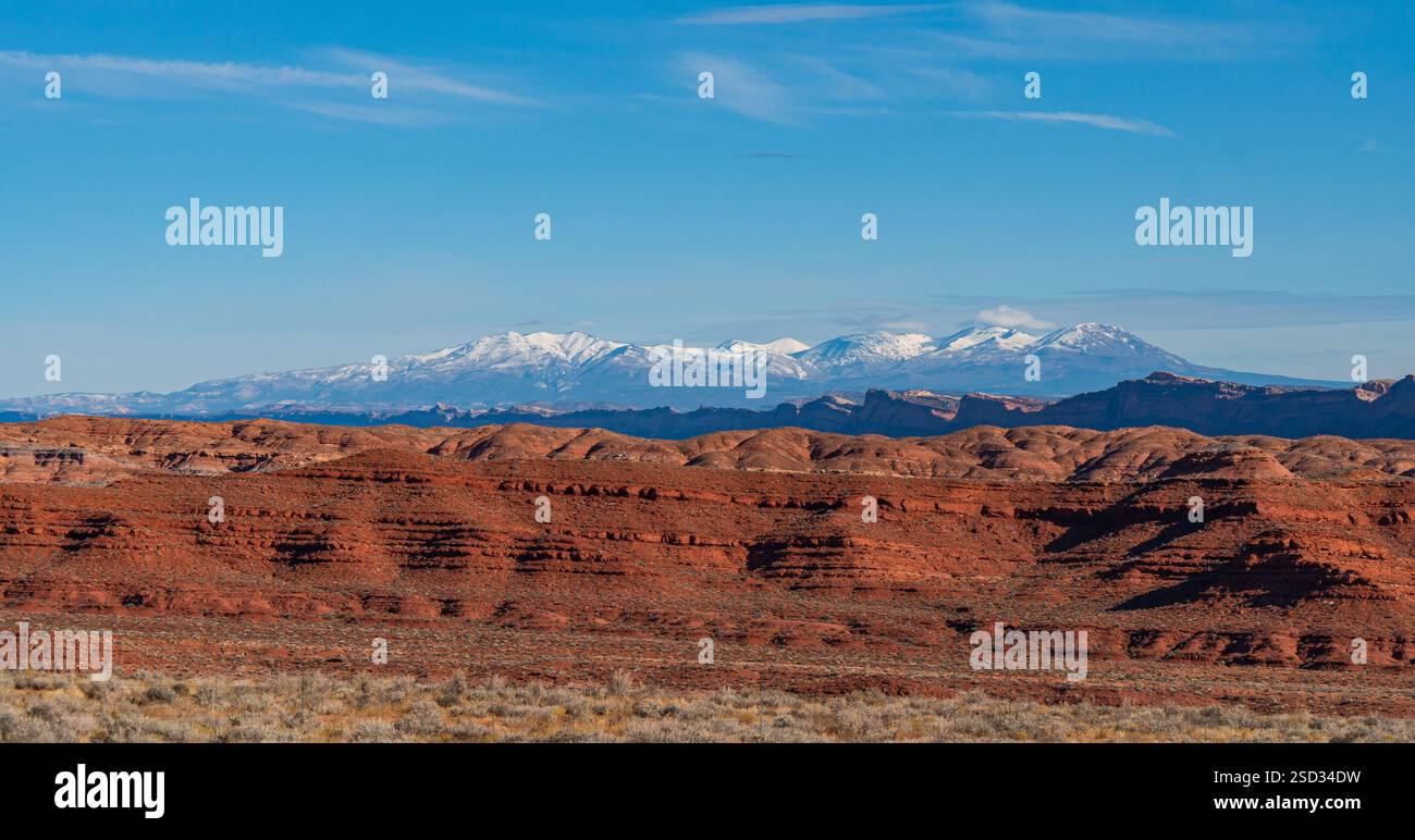 Utah, USA, landscapes of the southwest. Red sandstone hills and snowy ...