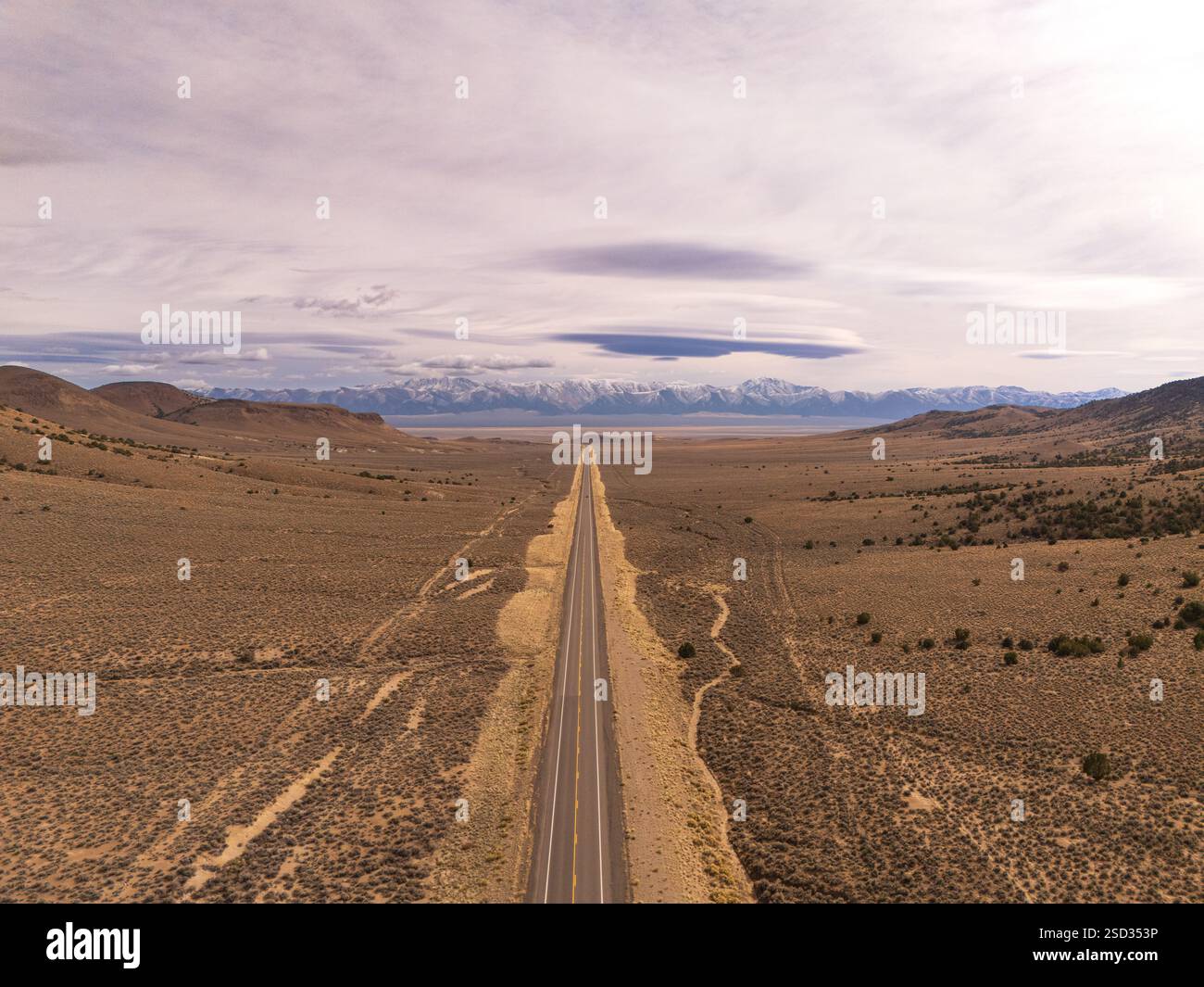 The loneliest road in Nevada, route 50, aerial view, clouds passing ...