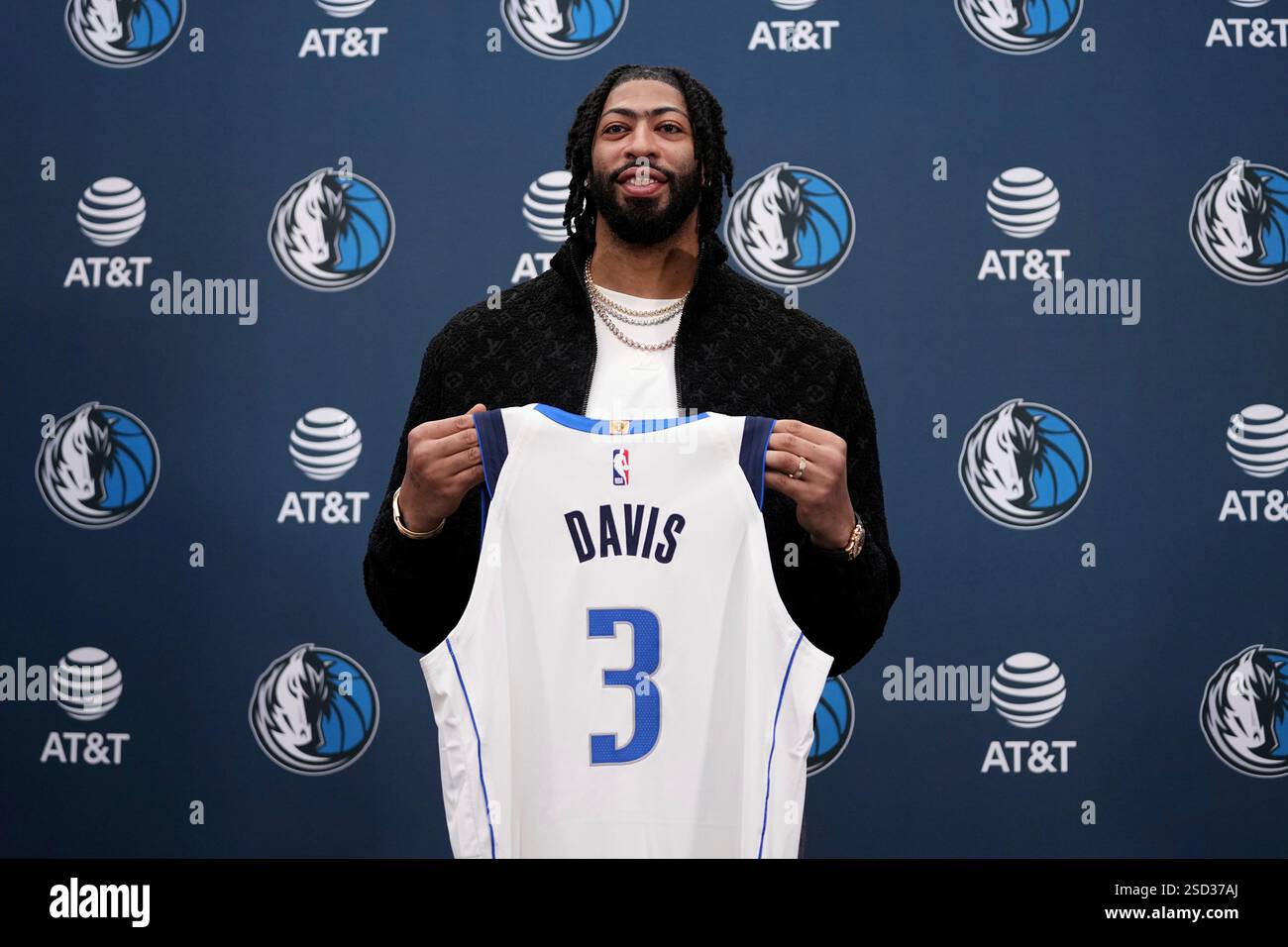 Dallas Mavericks new player Anthony Davis poses for a photo with his ...