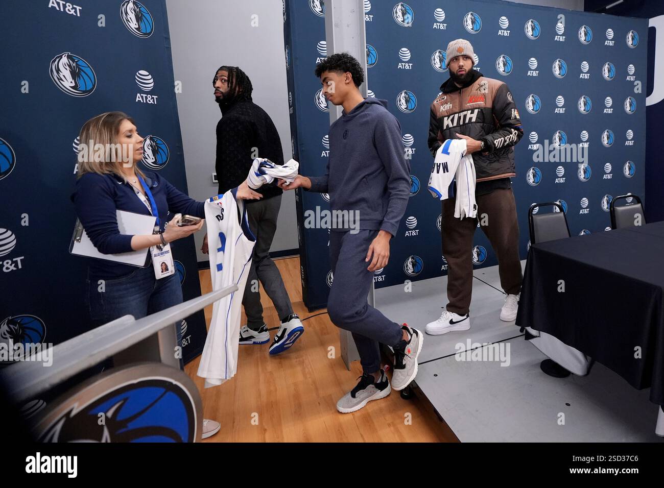 Newly acquired Dallas Mavericks players, Anthony Davis, second from ...