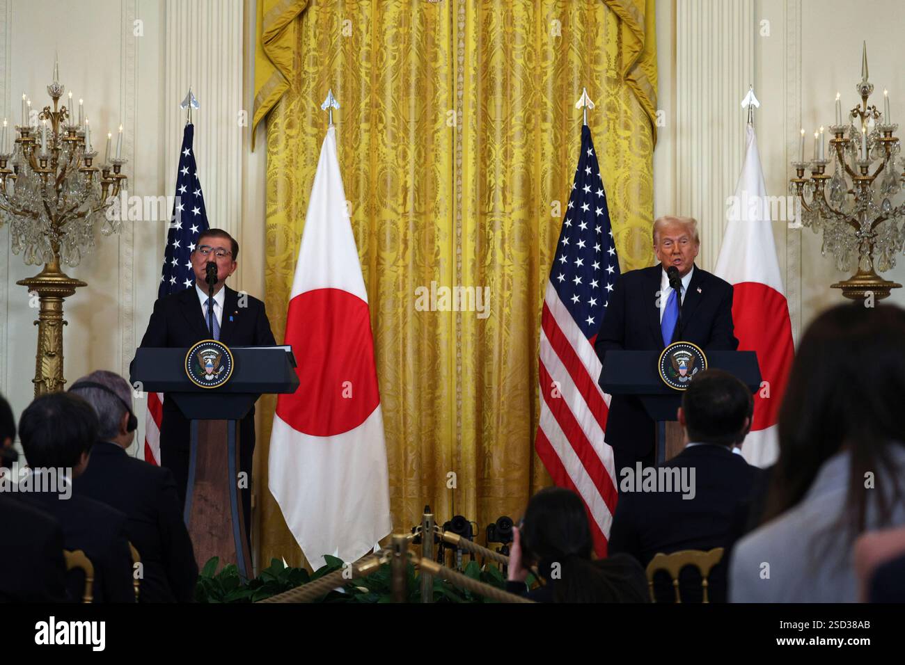 Japanese Prime Minister Shigeru Ishiba (L) and U.S. President Donald ...