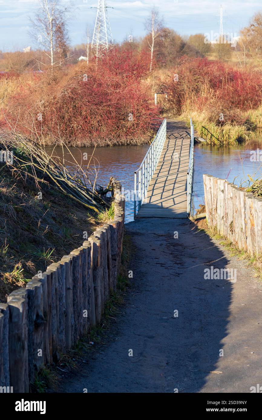 Shot of the small bridge over the river Stock Photo - Alamy