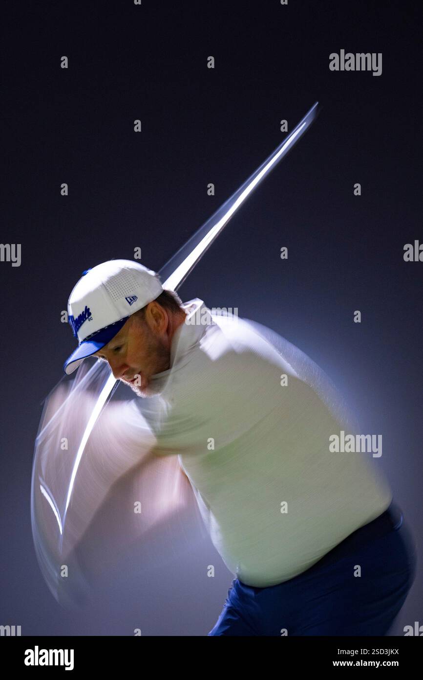 Graeme McDowell of Smash GC hits his shot from the 14th tee during the ...