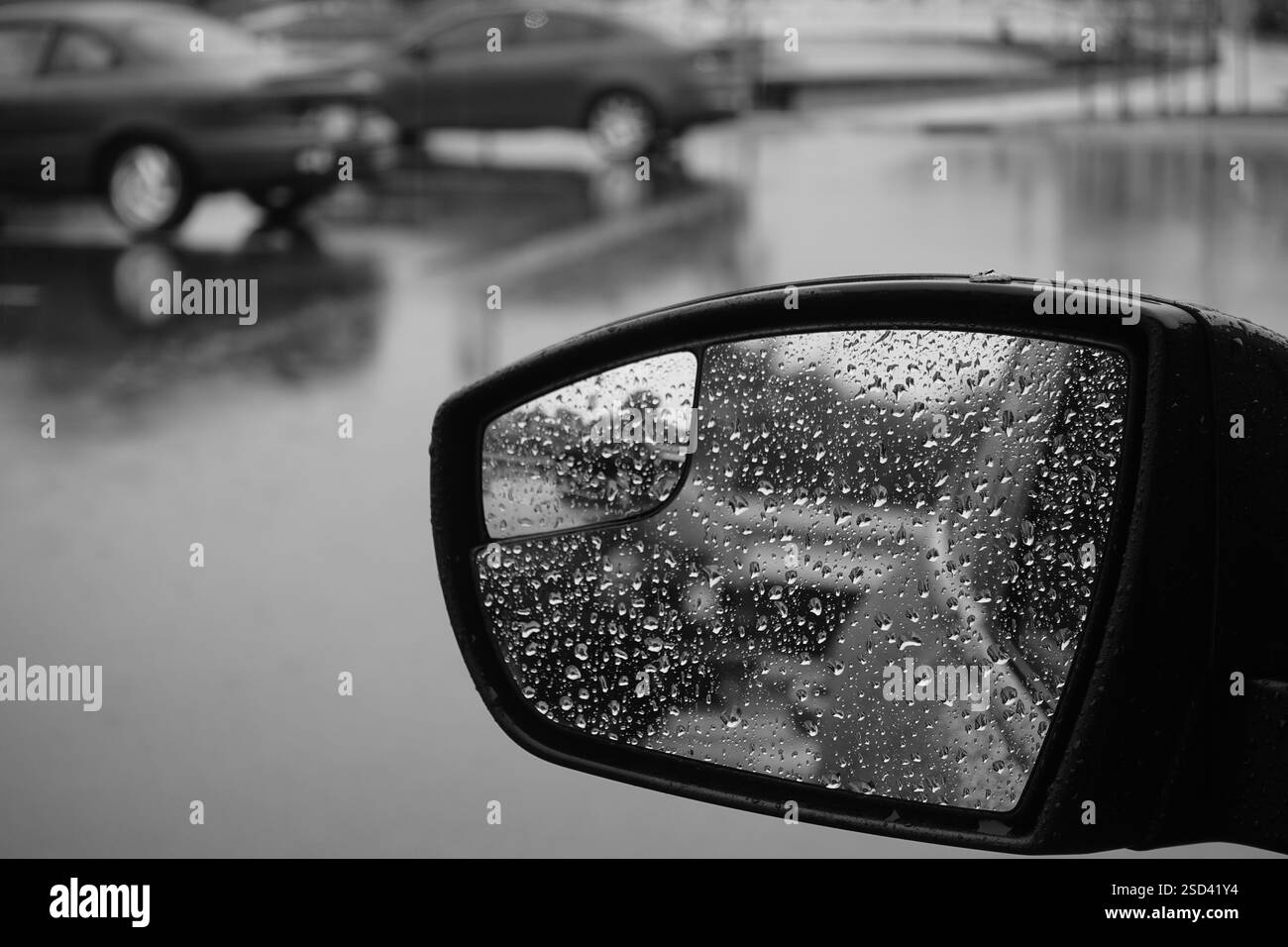 rainy day mirror reflection from car mirror Stock Photo - Alamy