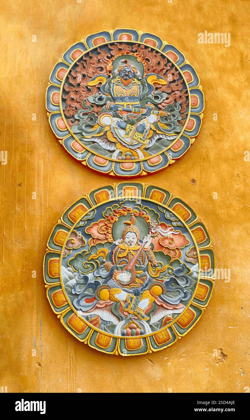 SEATTLE - SEP 23, 2024 - Two colorful mandalas are mounted on a yellow ...