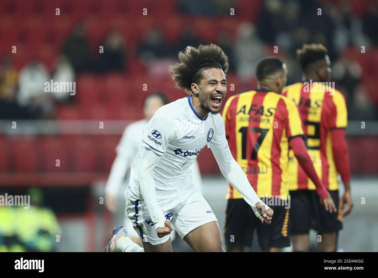 Gent's Hugo Gambor celebrates after scoring during a soccer match ...