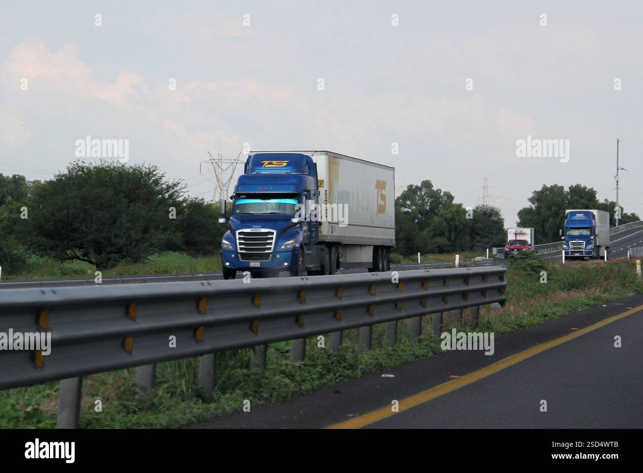 Queretaro, Mexico - Jul 28 2024: Trailers on the highway from CDMX to ...