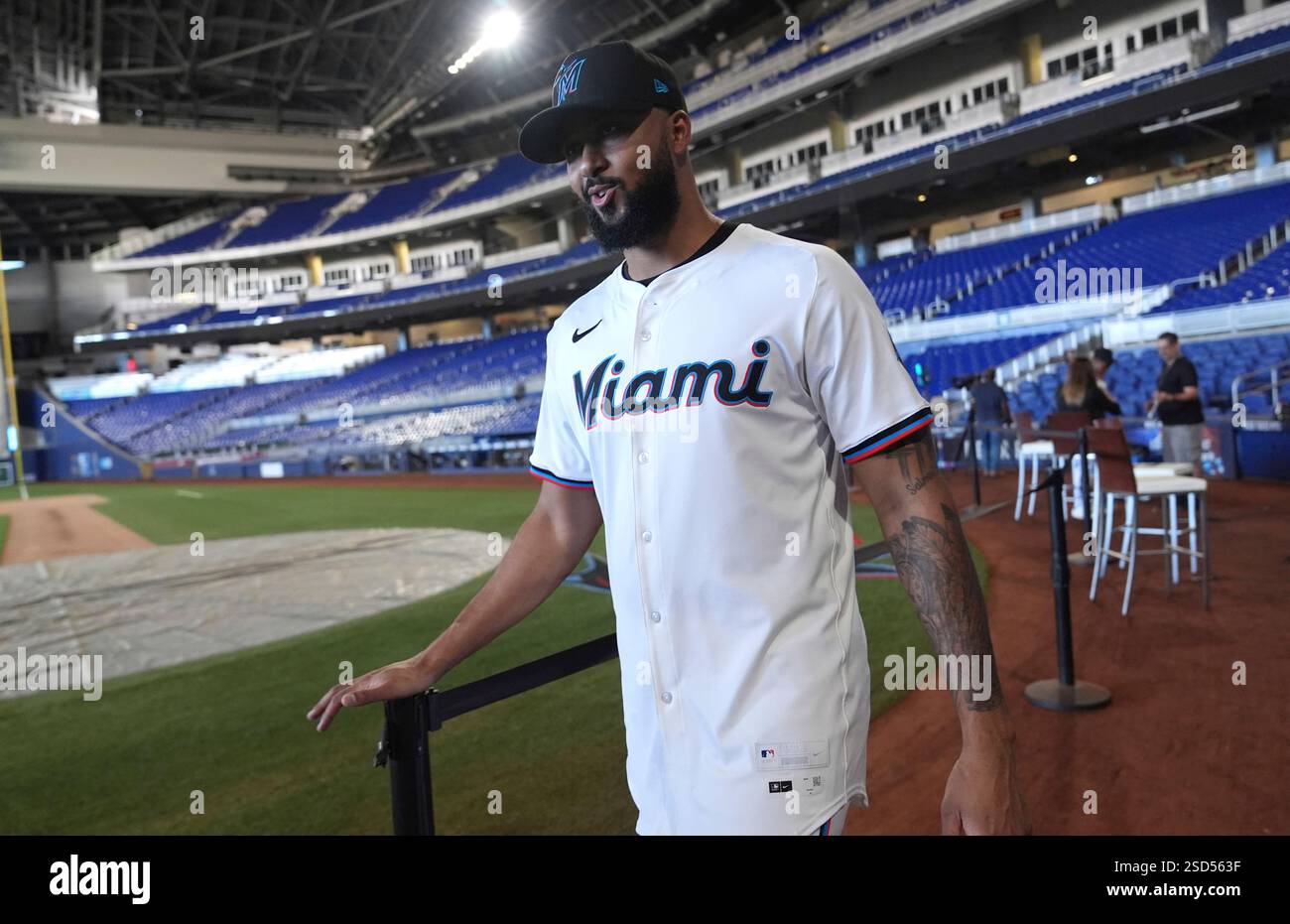 Miami Marlins starting pitcher Sandy Alcantara walks on the field ...