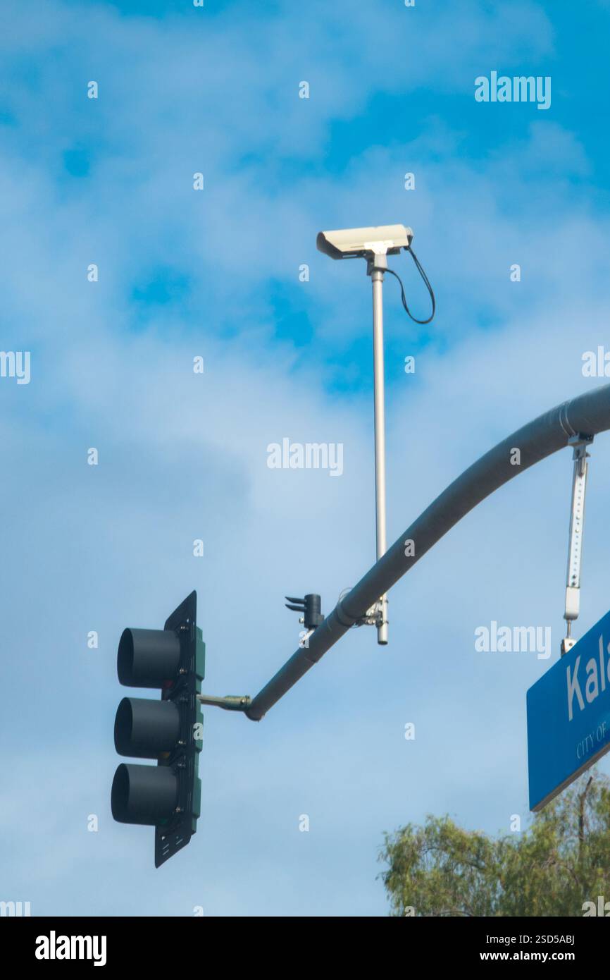 Surveillance camera mounted on a traffic light pole Stock Photo - Alamy