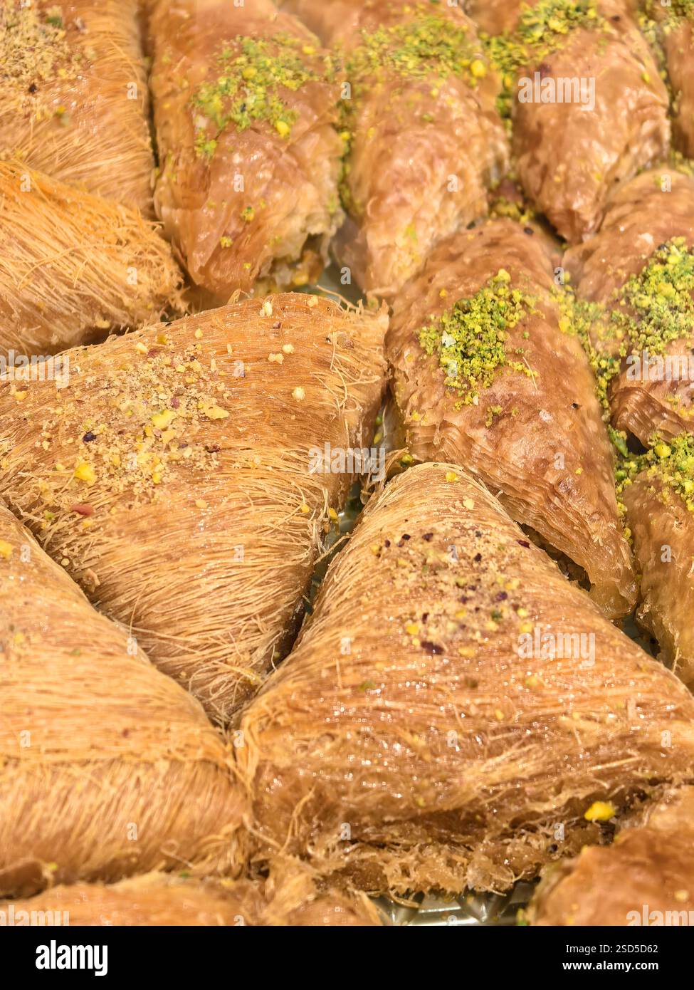 Golden layers of flaky pastry filled with aromatic nuts and syrup ...