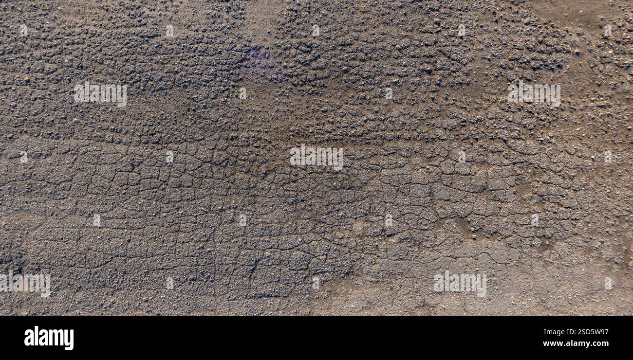 view from above on texture of old asphalt road with cracks Stock Photo ...