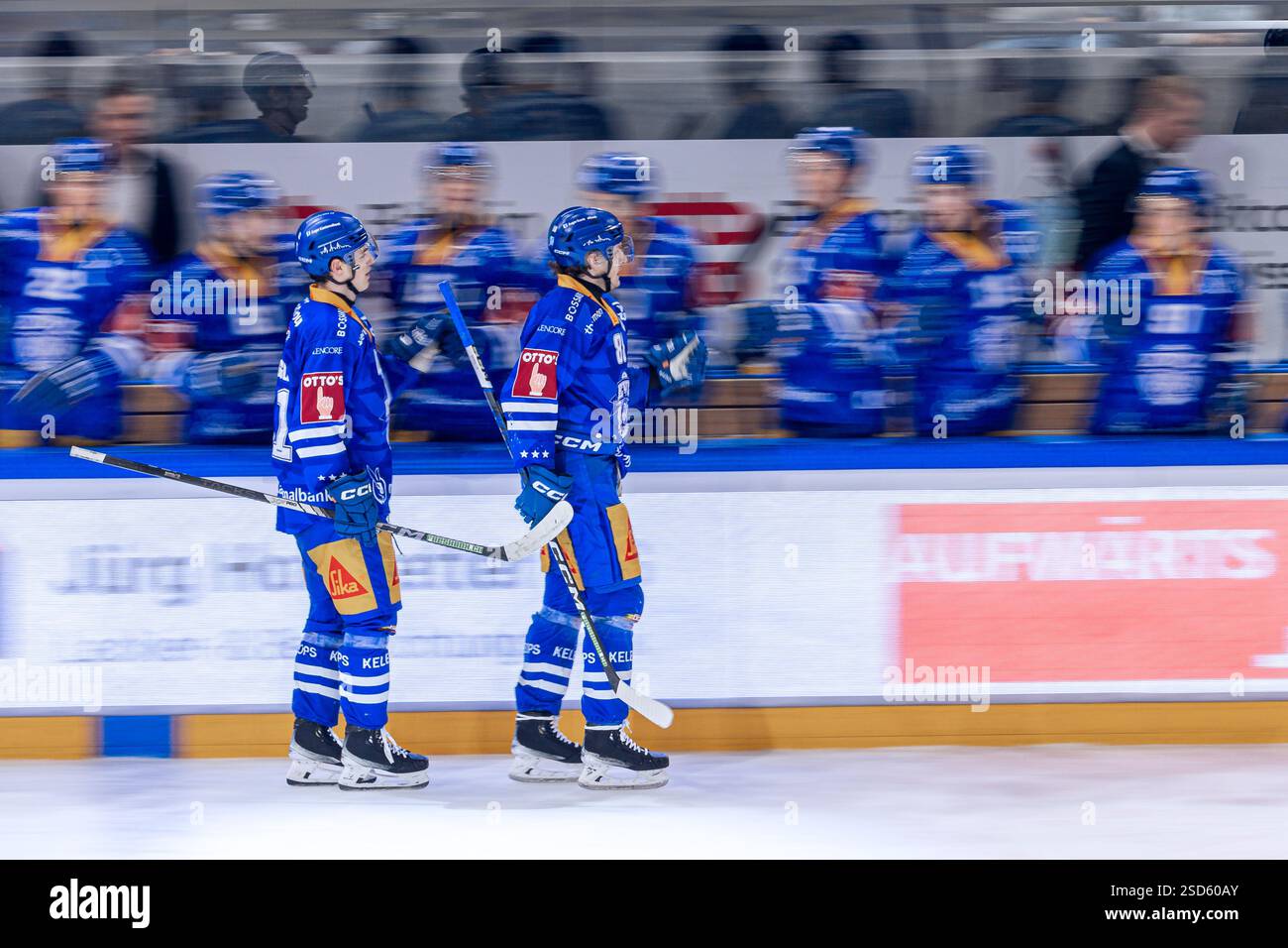 Panning shot with Leon Muggli #41 (EV Zug) and Sven Senteler #88 (EV ...