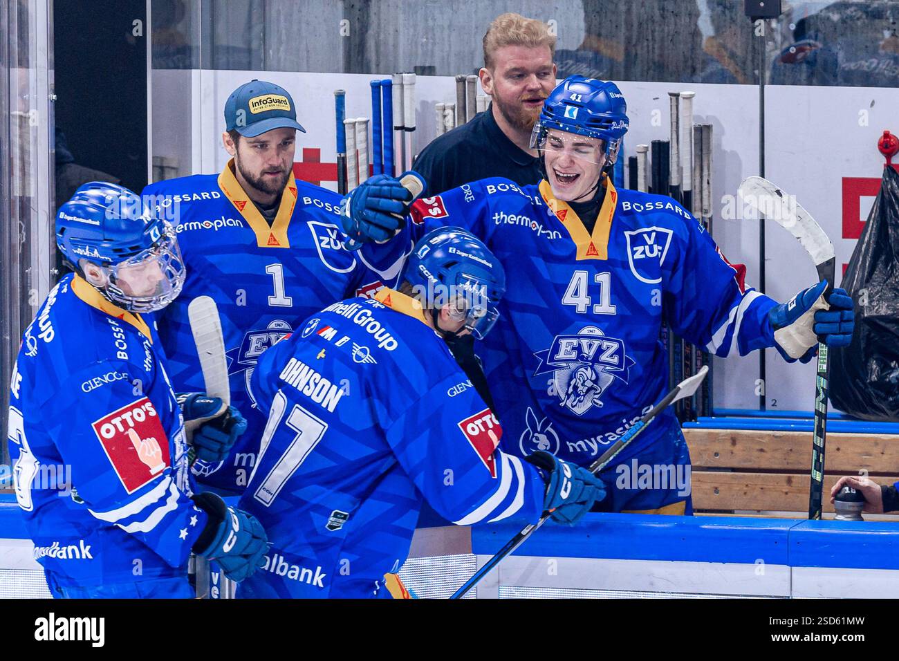 Leon Muggli #41 (EV Zug) congratulates Ludvig Johnson #97 (EV Zug) on ...