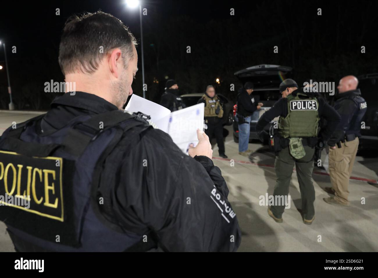 Officers with U.S. Immigration and Customs Enforcement arrest fugitives ...