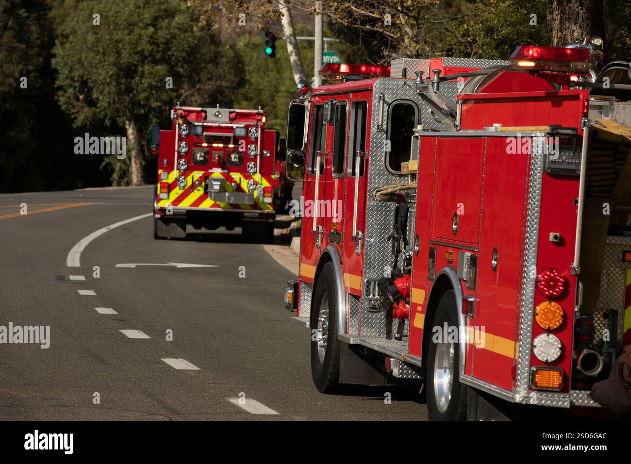 Red fire engines respond to the scene of an emergency Stock Photo - Alamy