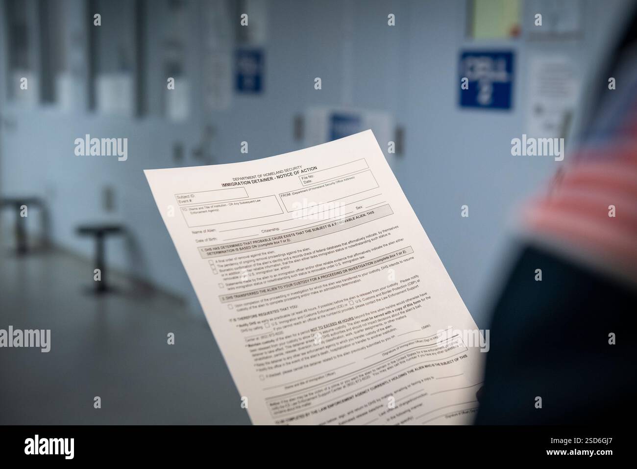 Photos of an Immigration Detainer form taken at a detention facility ...