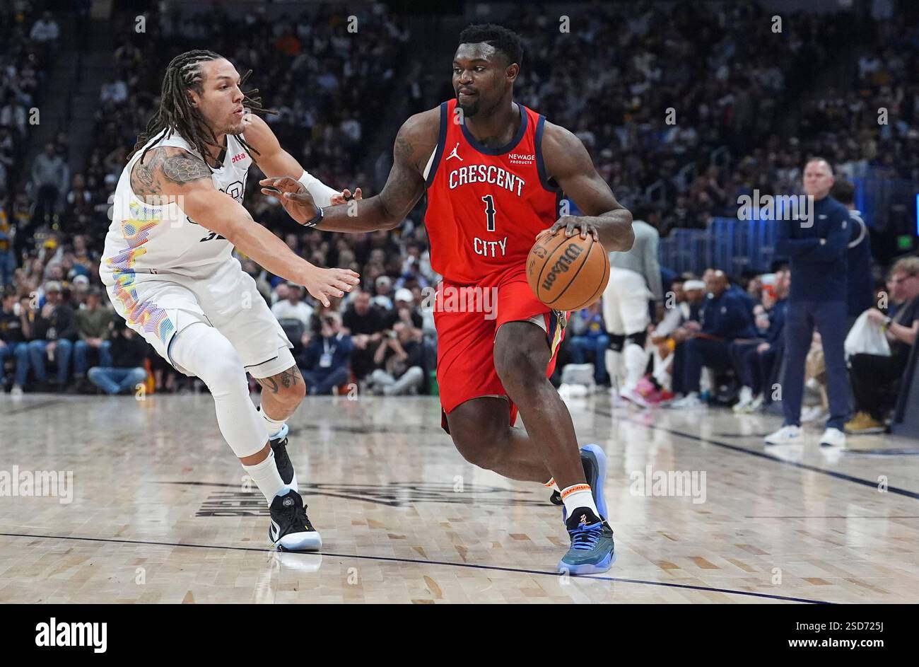 Denver Nuggets forward Aaron Gordon (32) checks New Orleans Pelicans ...