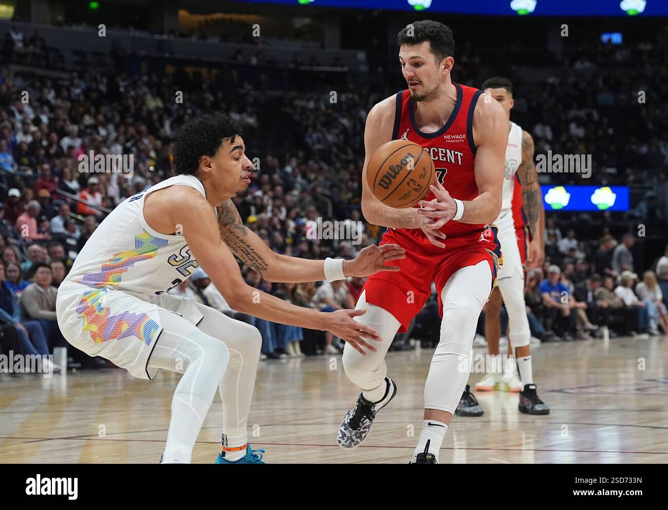 Denver Nuggets guard Julian Strawther (3) and New Orleans Pelicans ...