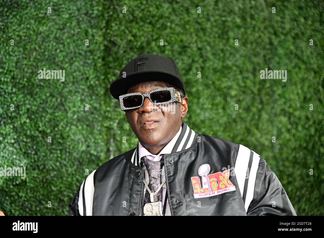 February 6, 2025, New Orleans LA; Flavor Flav poses on the red carpet ...