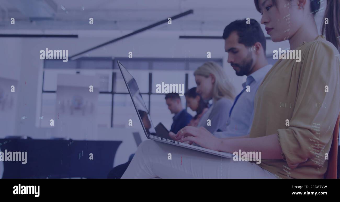 Image of professionals in office using laptops during business meeting ...