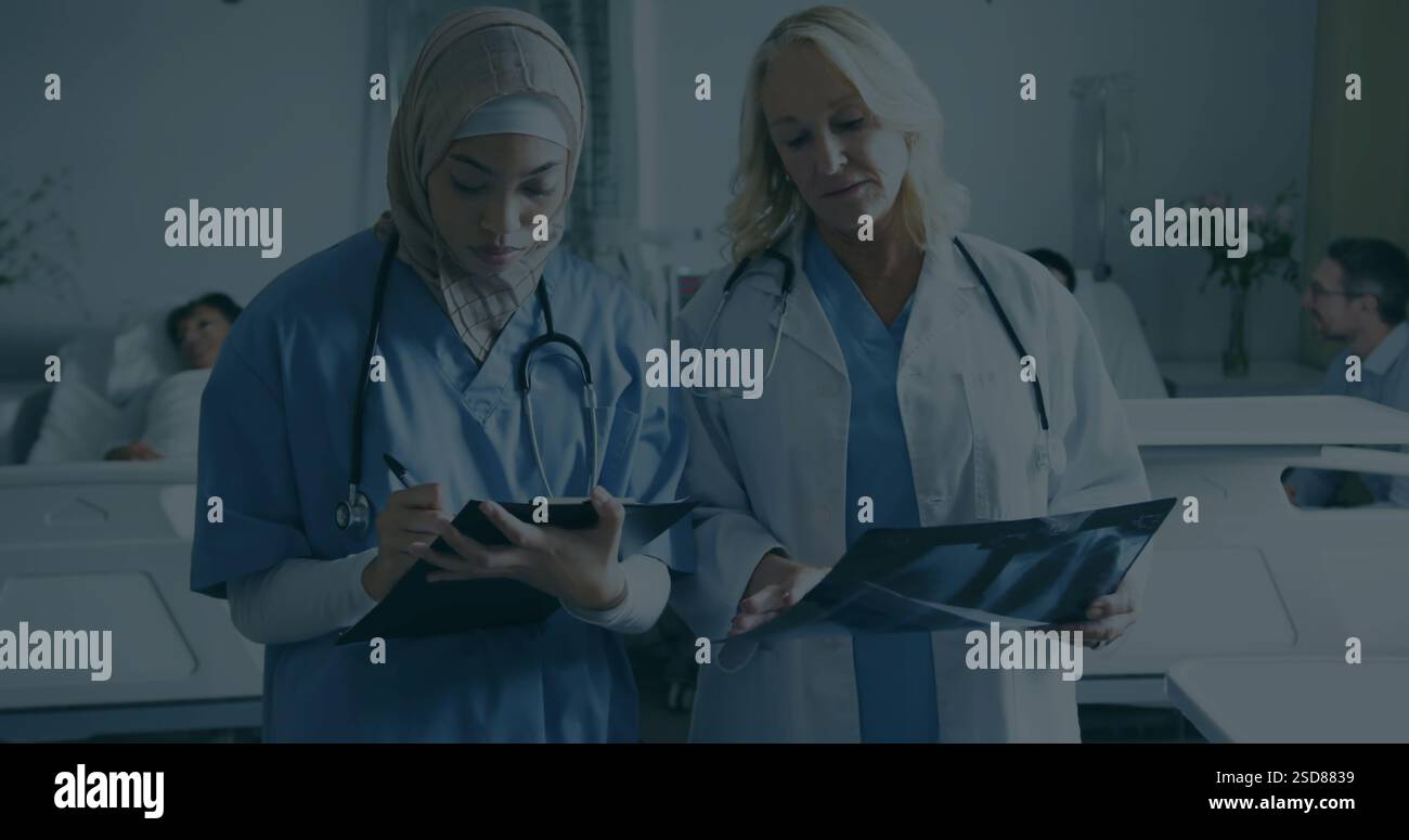 Medical team reviewing patient records hi-res stock photography and ...