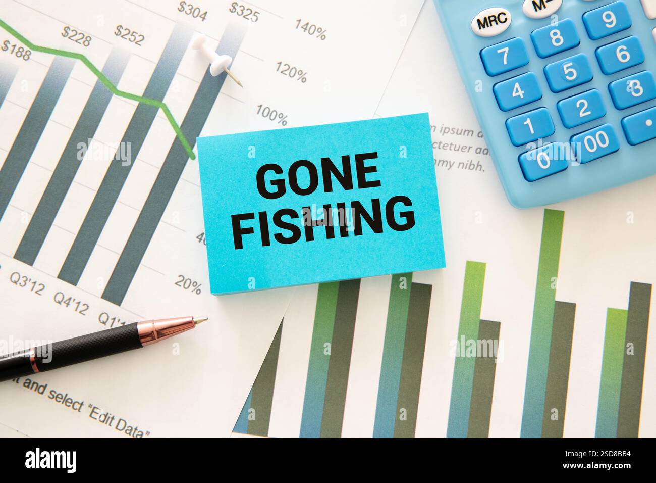 Post it note on wood in blue with gone fishing Stock Photo - Alamy