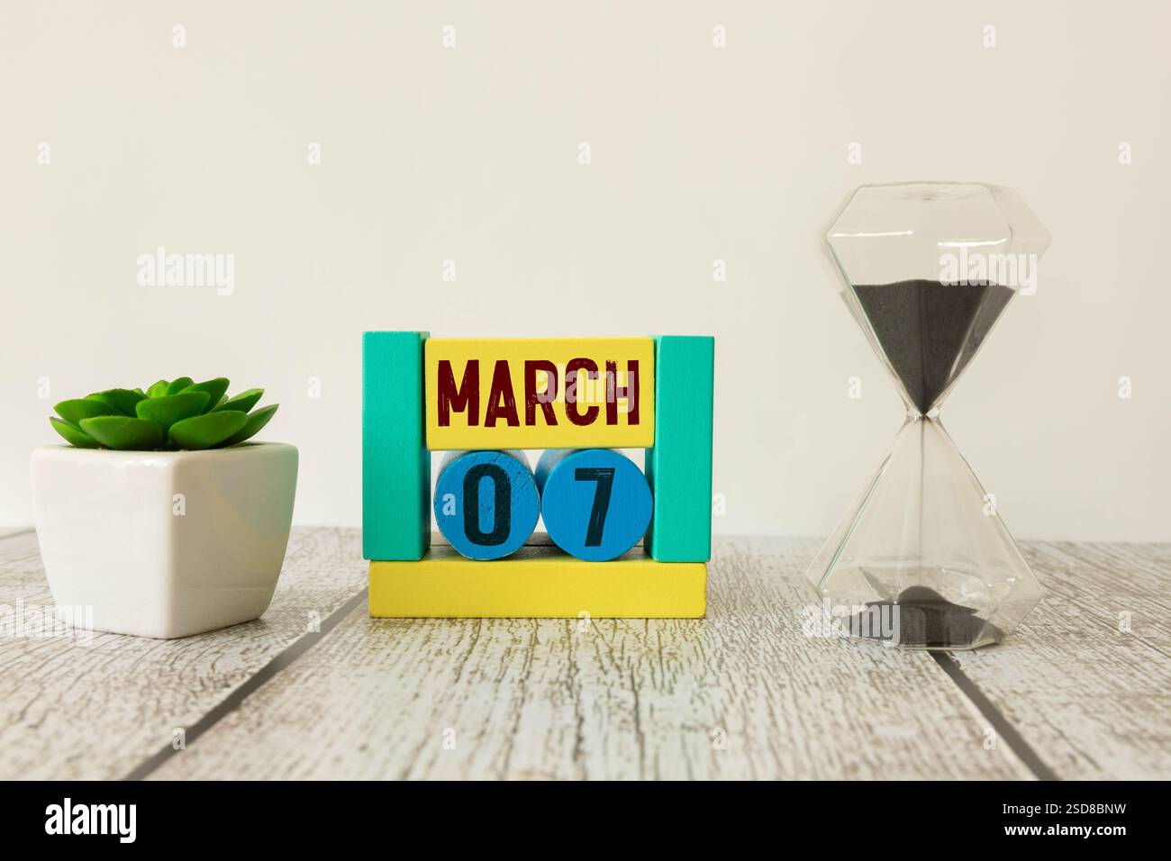 Day 7 of March month, Wooden calendar with date. Empty space for text ...