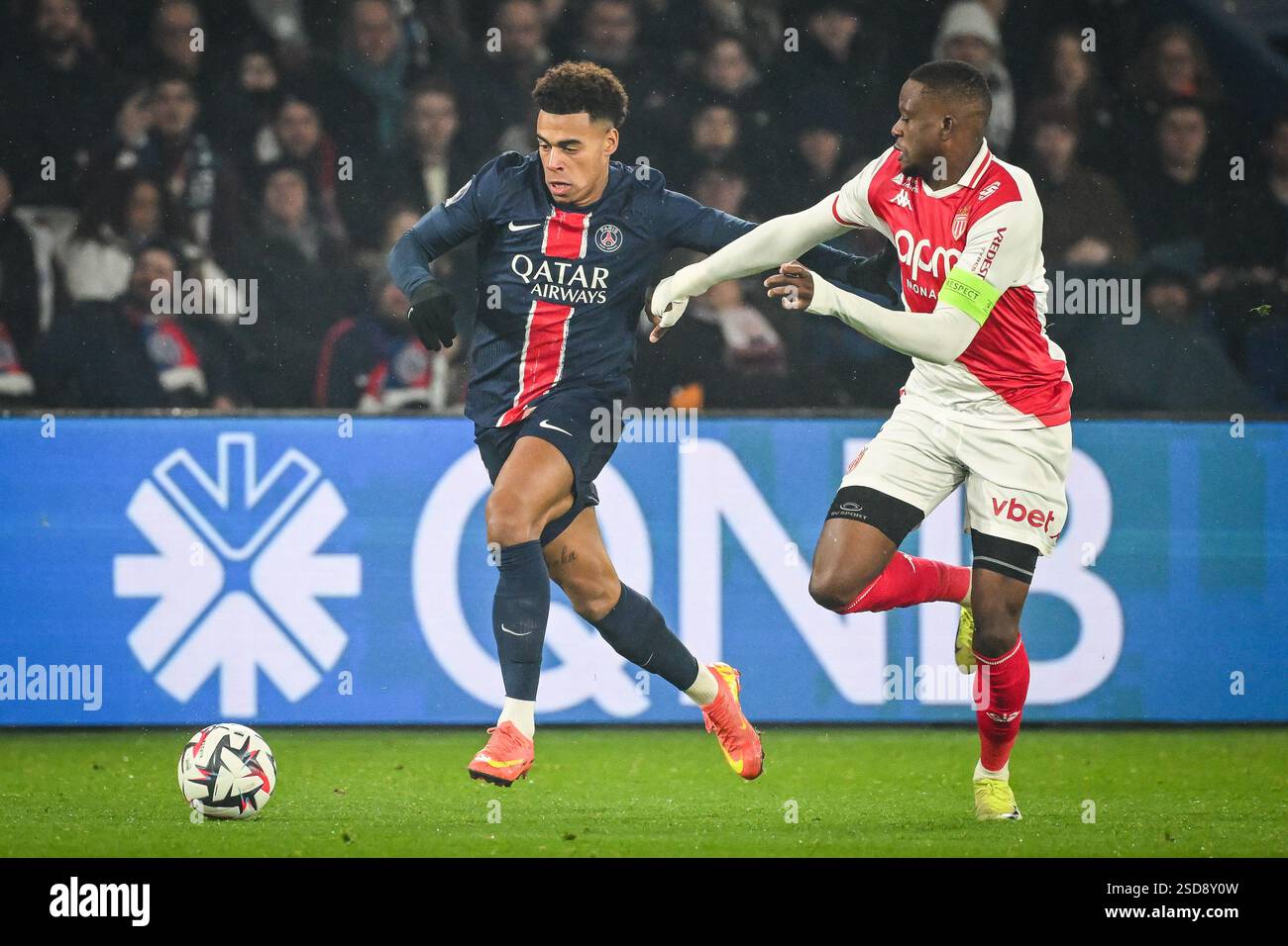 Desire DOUE of PSG and Denis ZAKARIA of Monaco during the French ...