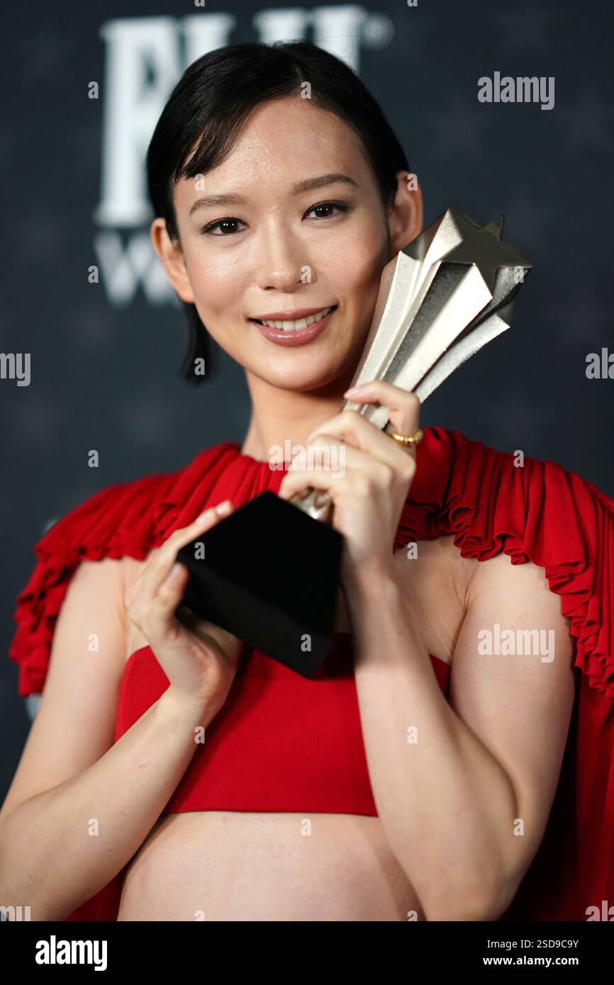 Moeka Hoshi poses in the press room with the award for best supporting ...