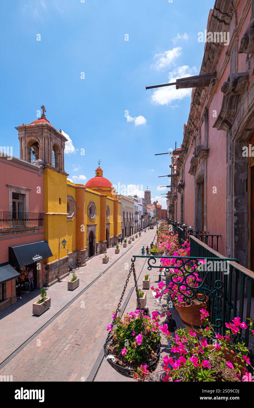 View of a walkway street from a colonial baroque house balcony in ...