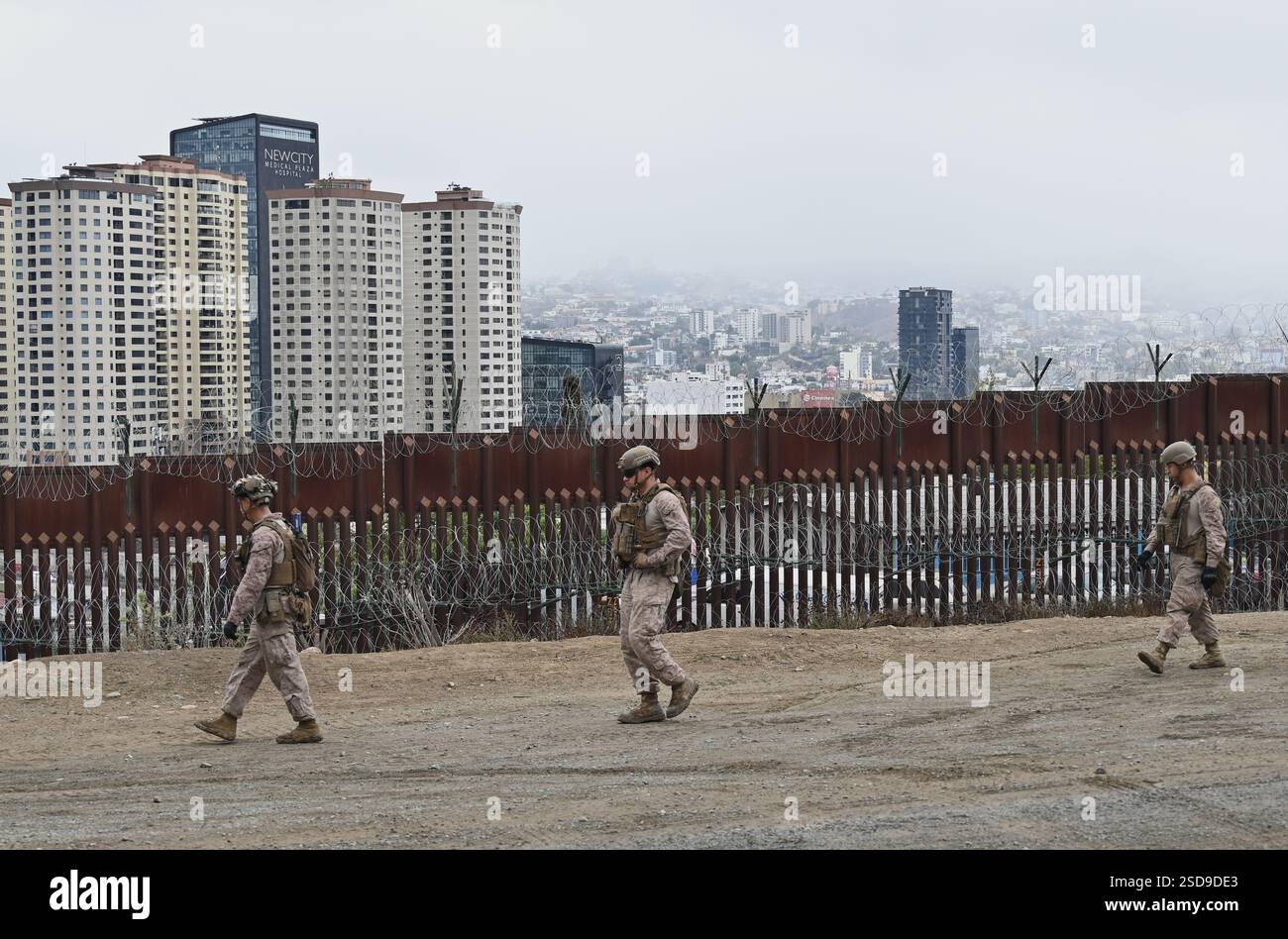 United States Marine Corps troops patrol the US-Mexico border area as ...