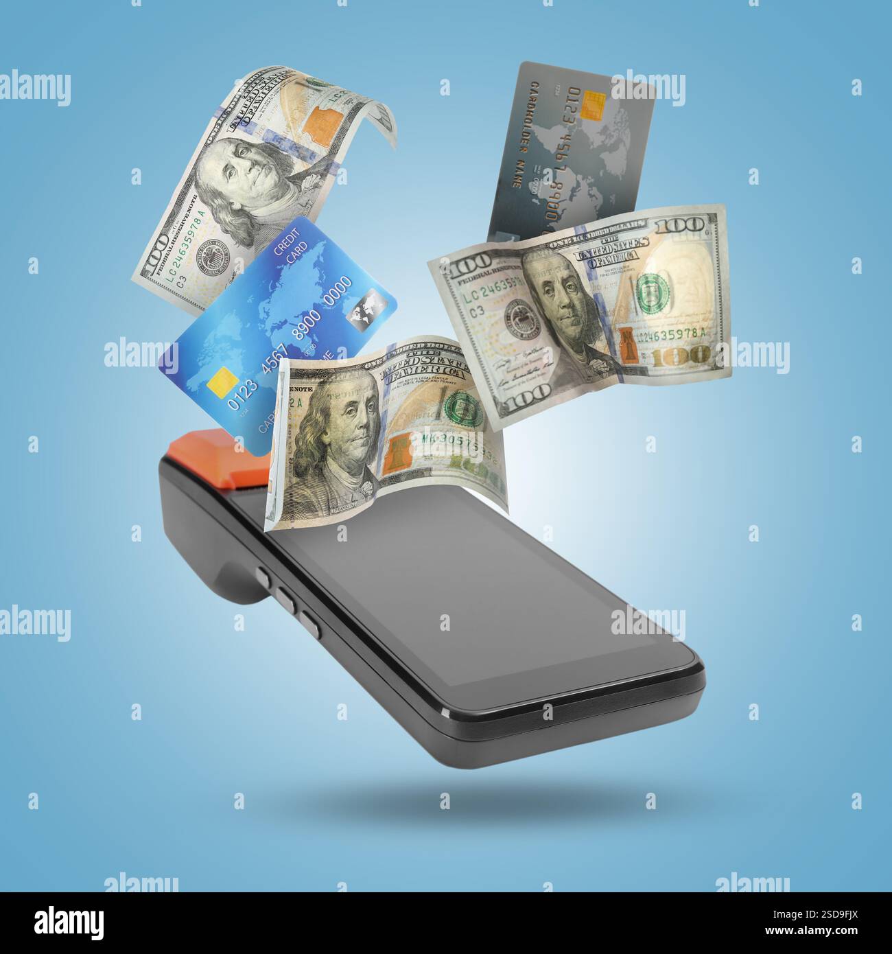 Payment terminal, bank cards and dollars in air on light blue ...