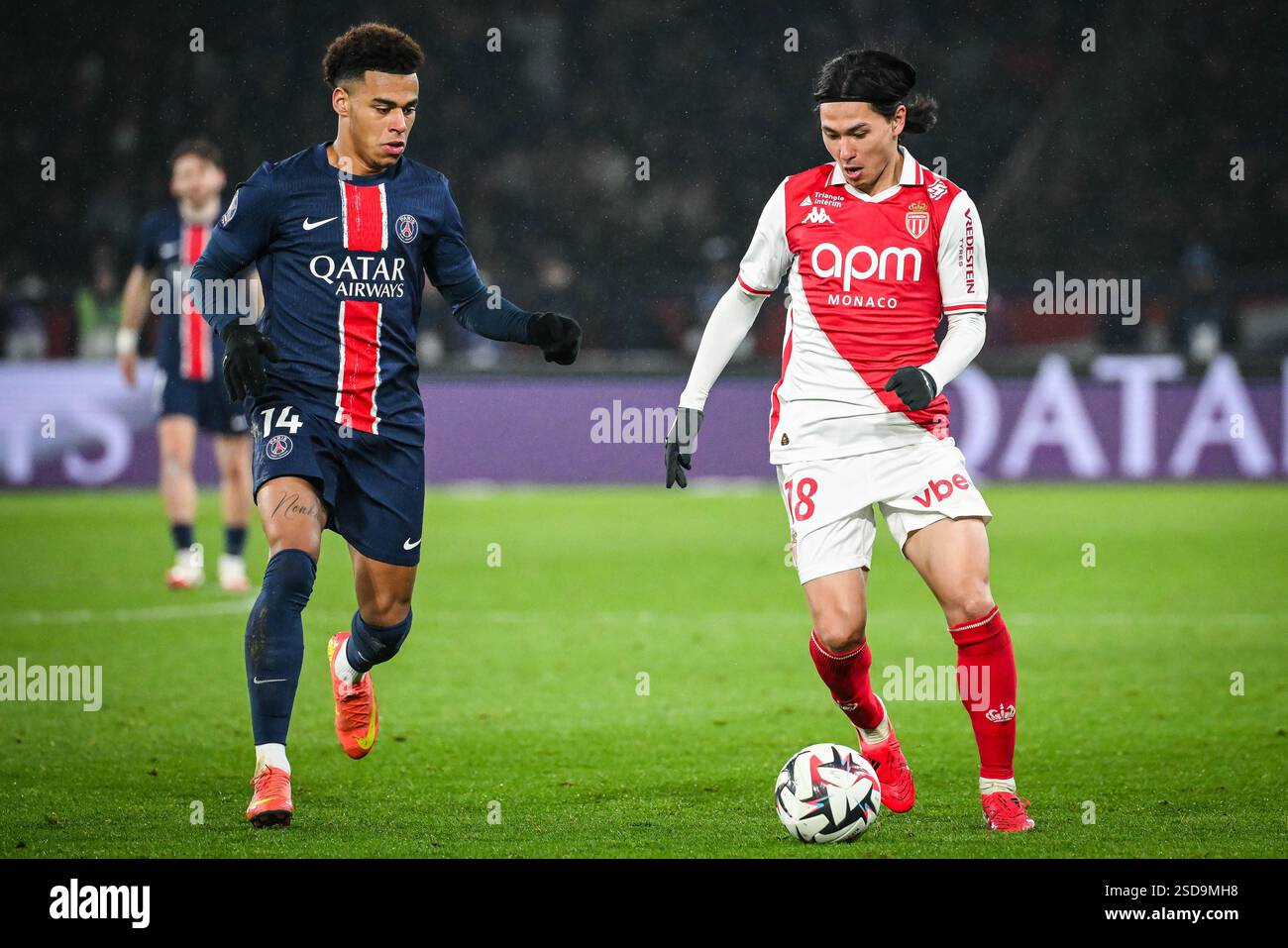 Paris, France. 07th Feb, 2025. Desire DOUE of PSG and Takumi MINAMINO ...