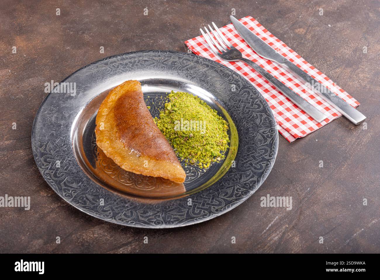 Traditional Turkish dessert called Arab Kadaif or tas kadayif. Turkish ...