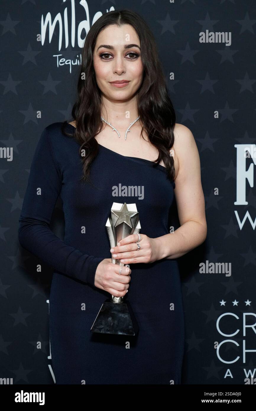 Cristin Milioti poses in the press room with the award for best actress ...
