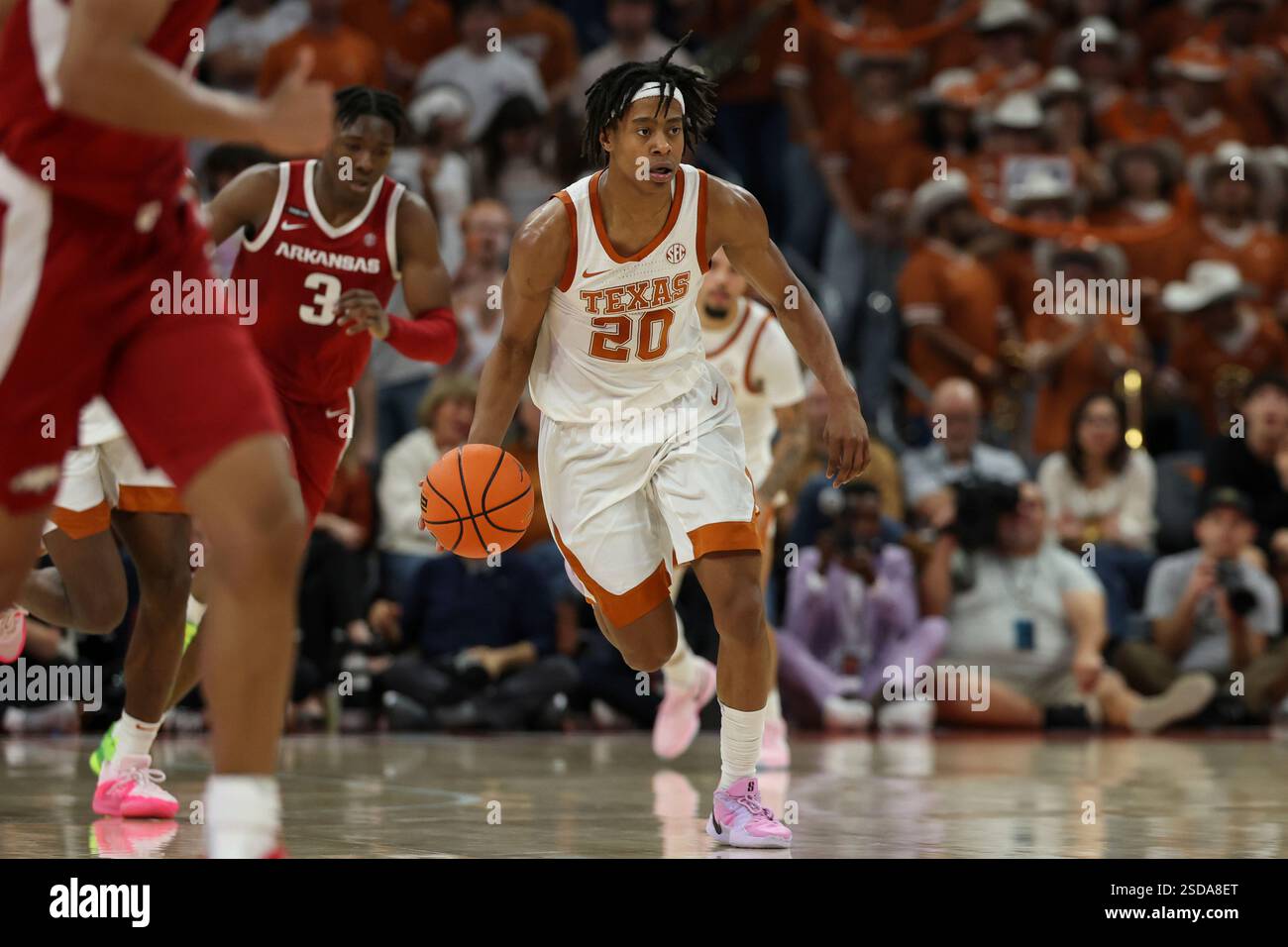 AUSTIN, TX - FEBRUARY 05: Texas Longhorns guard Tre Johnson (20) brings ...