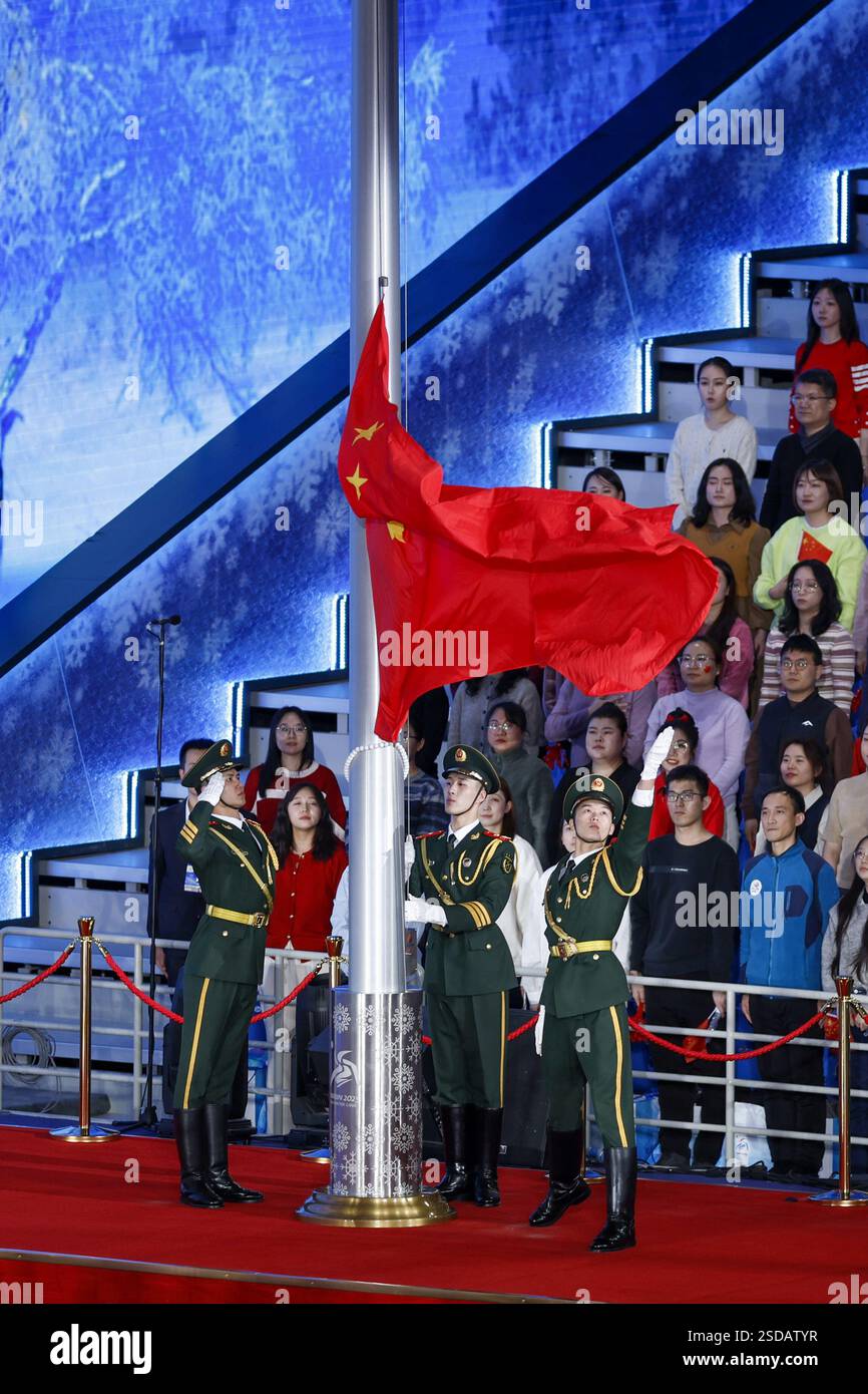 Harbin,China.7th February 2025. The Chinese national flag is raised ...