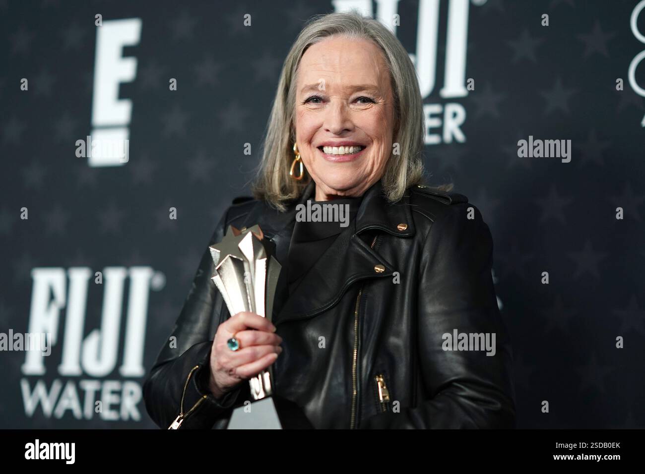 Kathy Bates poses in the press room with the award for best actress in ...
