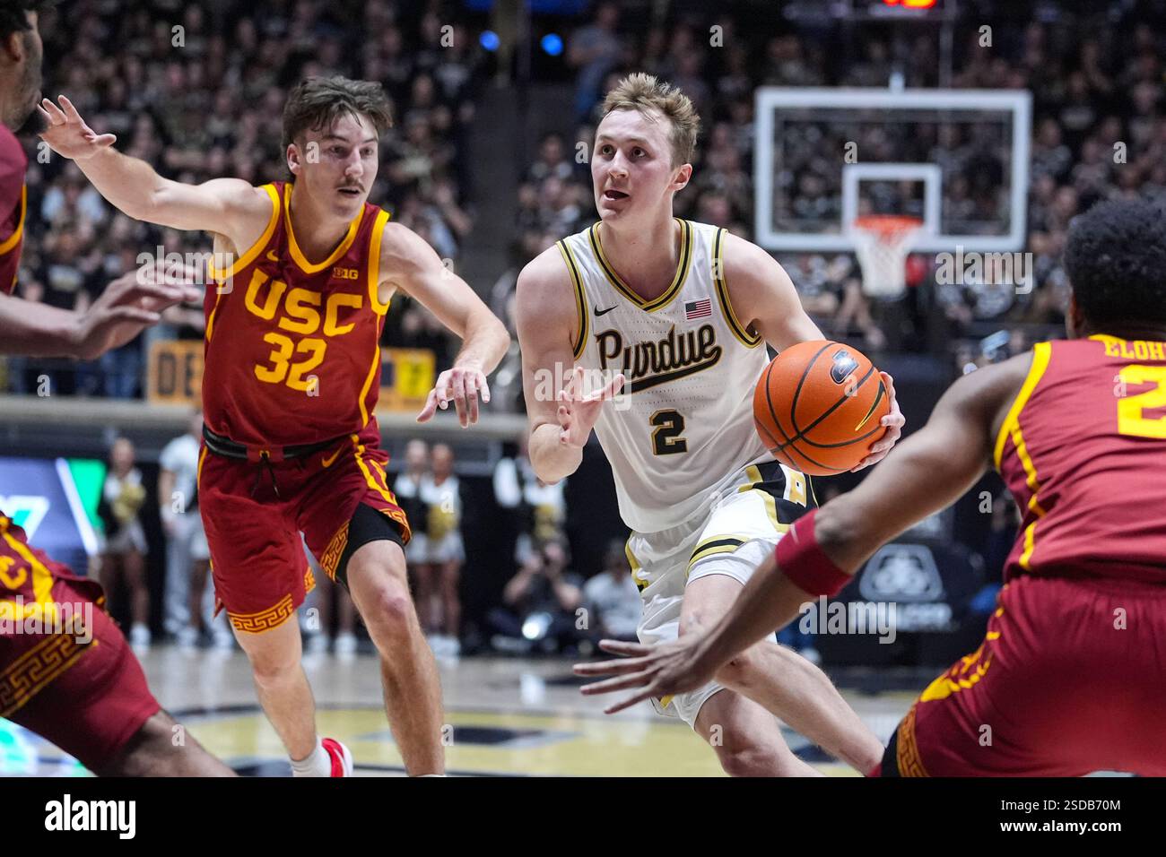 Purdue guard Fletcher Loyer (2) drives between Southern California ...