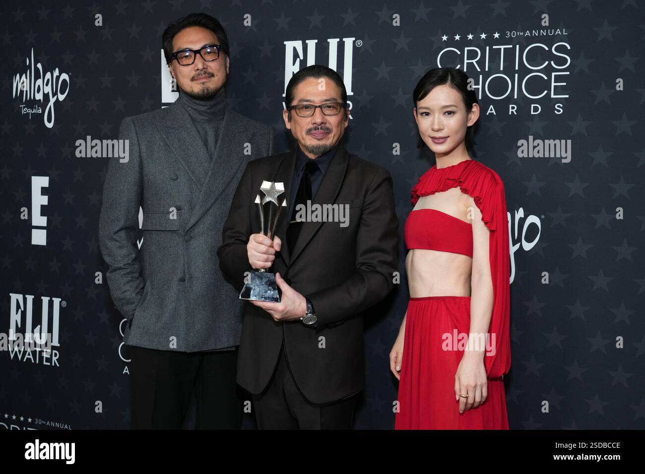 Takehiro Hira, from left, Hiroyuki Sanada and Moeka Hoshi pose in the ...