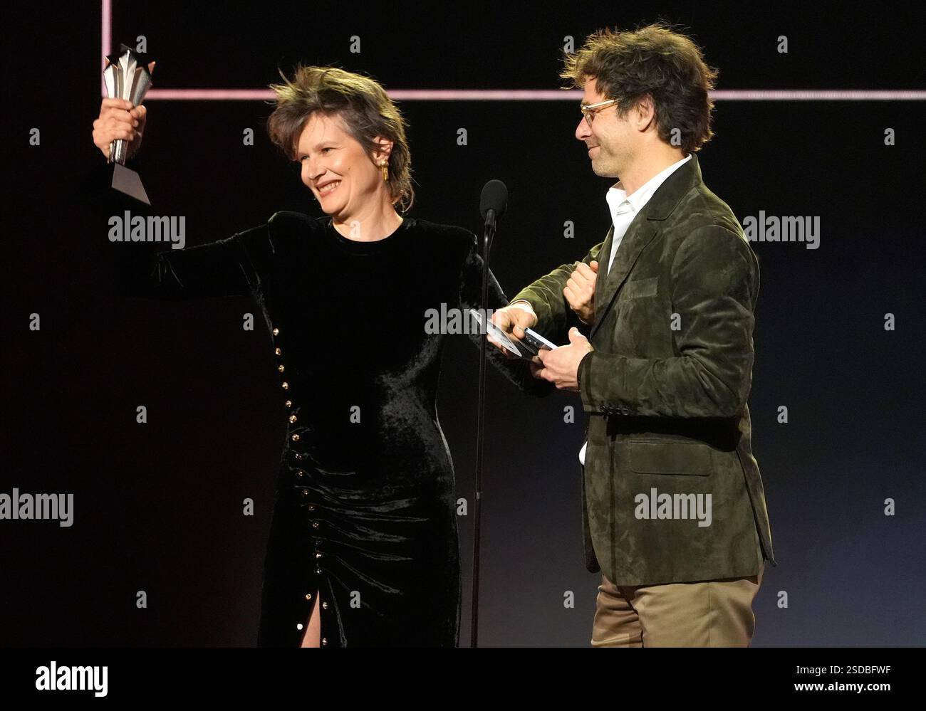 Camille, left, and Clément Ducol accept the award for best song for "El ...
