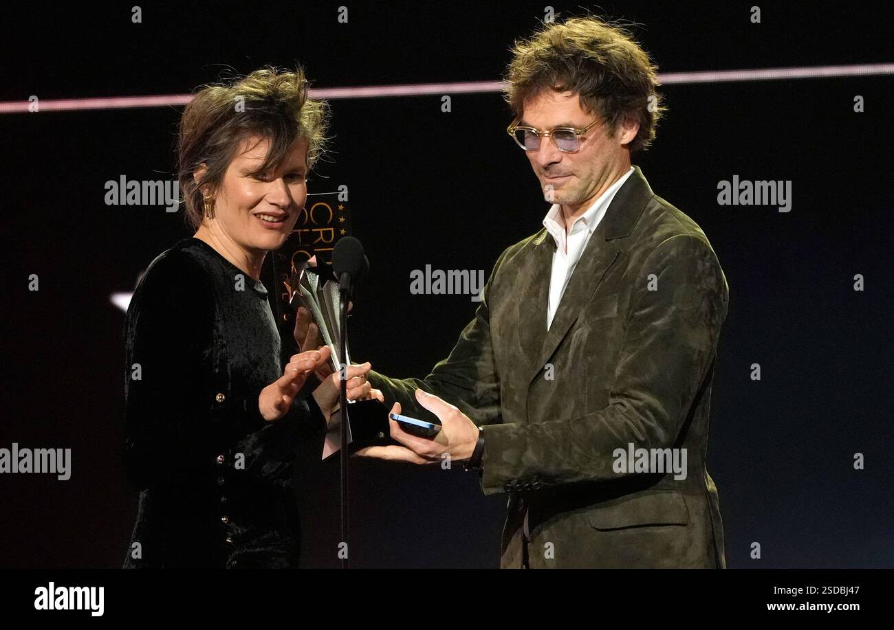 Camille, left, and Clément Ducol accept the award for best song for "El ...