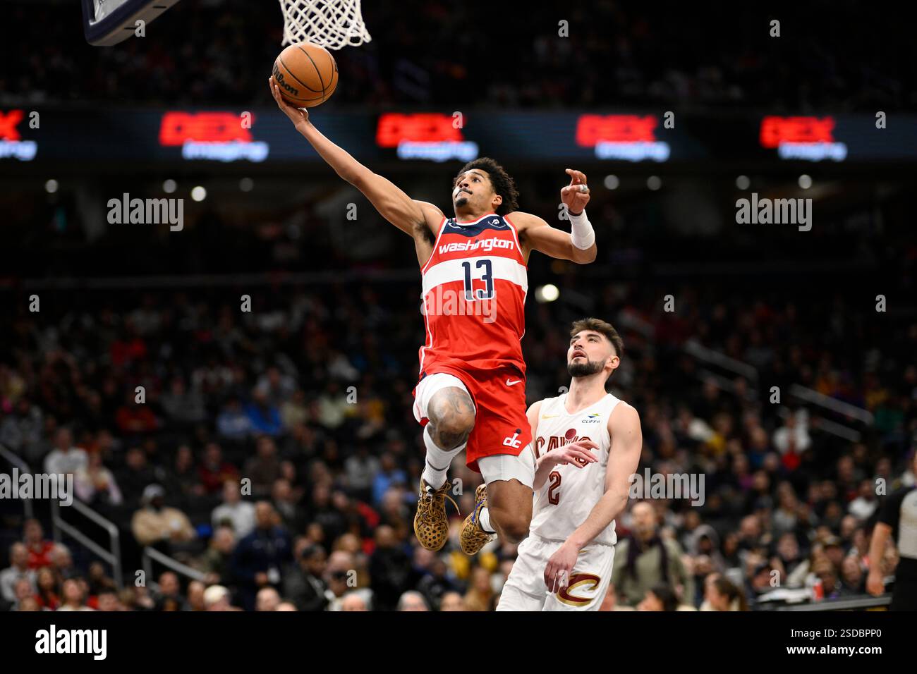 Washington Wizards guard Jordan Poole (13) goes to the basket past ...