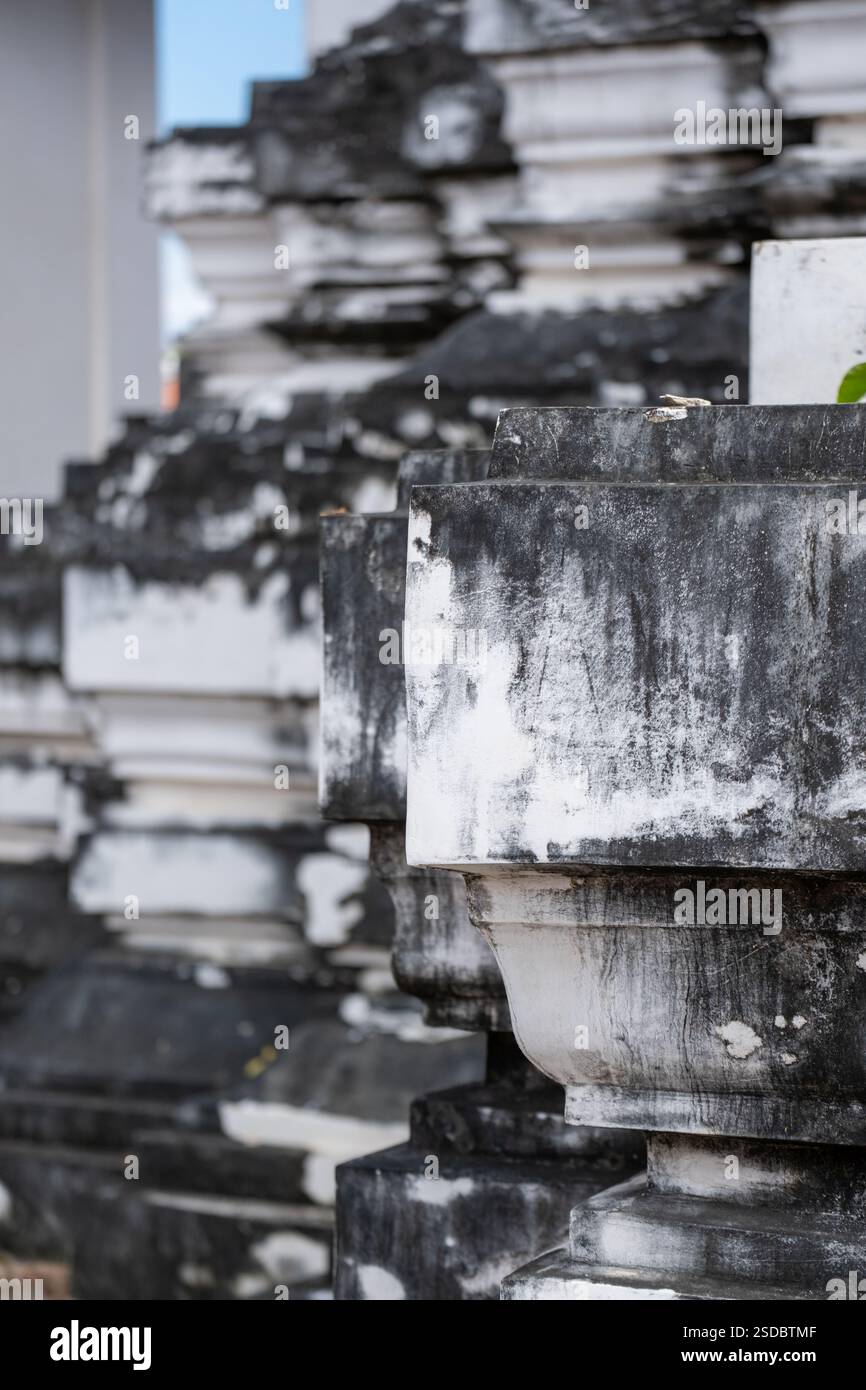 The corner detail of a religious building, pagoda, with layers of white ...