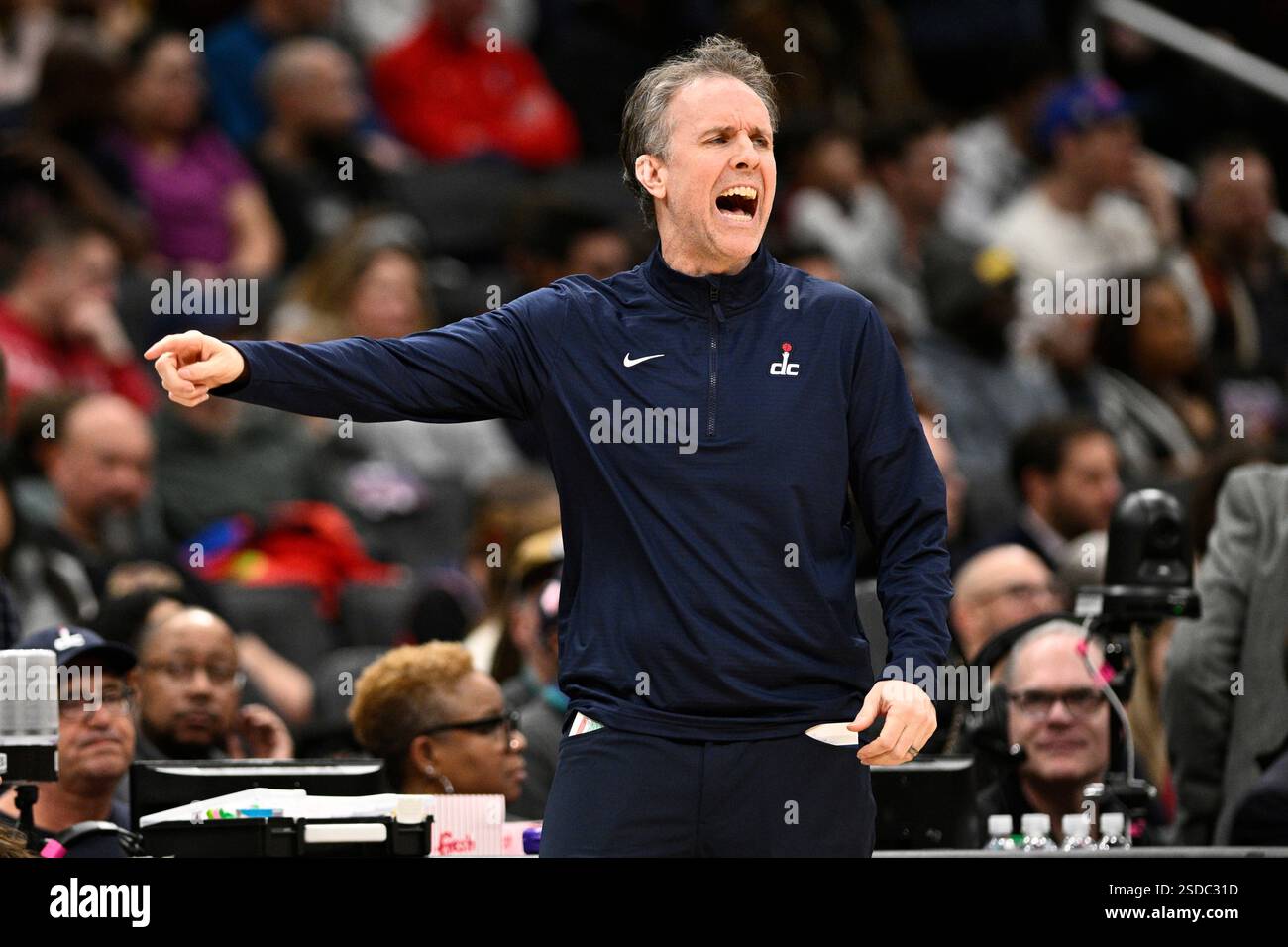 Washington Wizards head coach Brian Keefe reacts during the first half ...