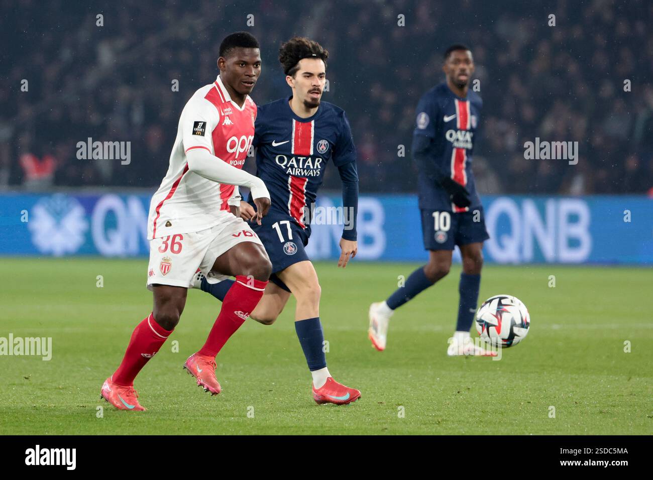 Paris, France. 07th Feb, 2025. Breel Embolo of Monaco, Vitinha of PSG ...