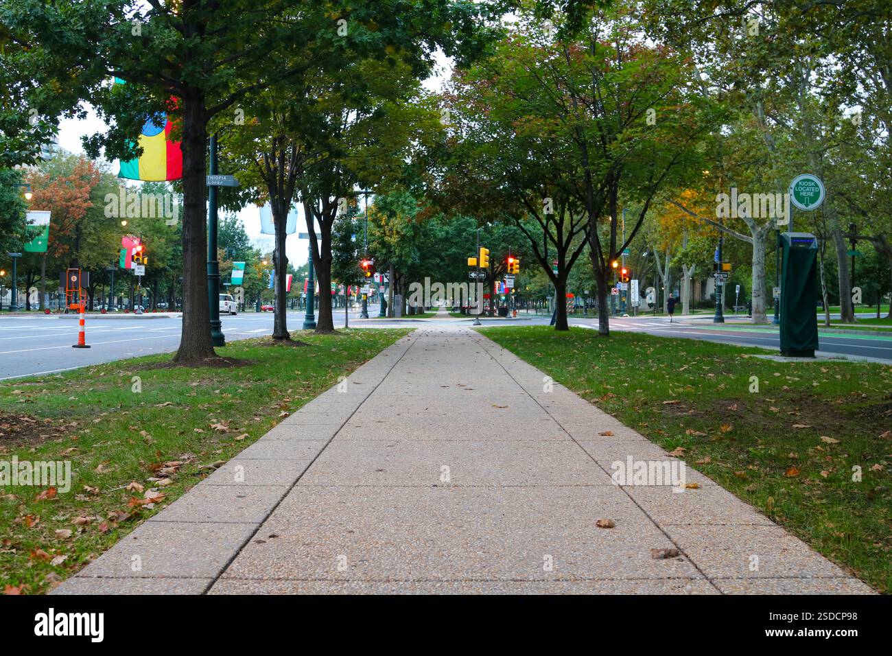 People stroll along pathway hi-res stock photography and images - Alamy